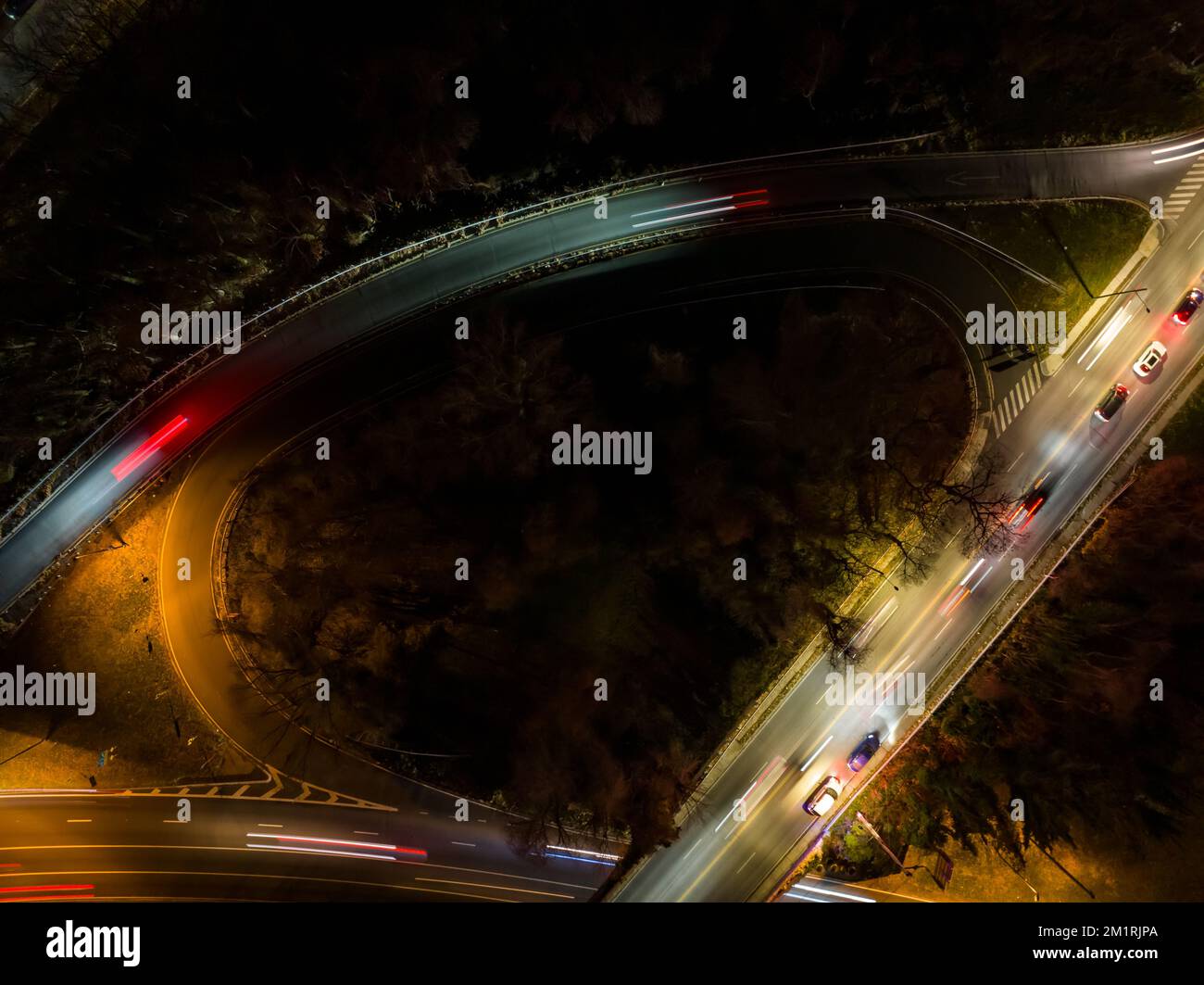 An aerial view of an exit ramp of a highway at night Stock Photo - Alamy
