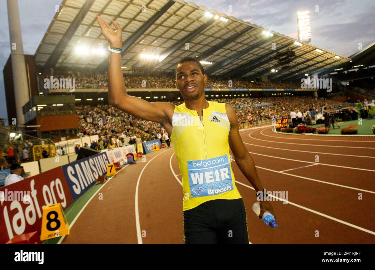 Jamaica's Warren Weir celebrates as he crosses the finish line to win ...