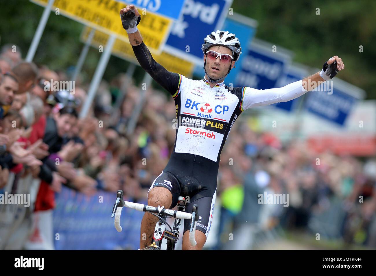 Belgian Niels Albert celebrates as he crosses the finish line to win ...