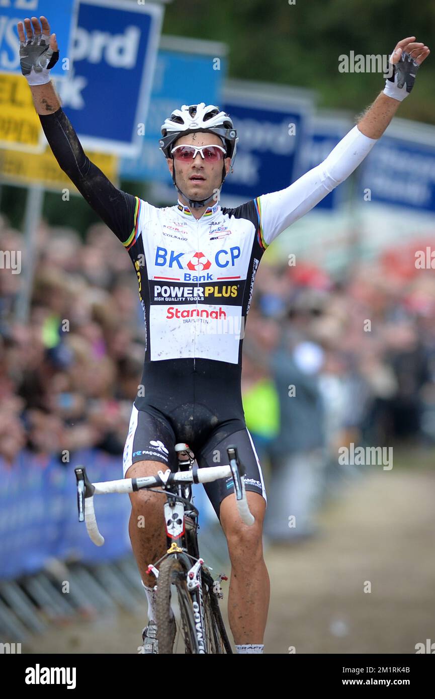 Belgian Niels Albert celebrates as he crosses the finish line to win ...