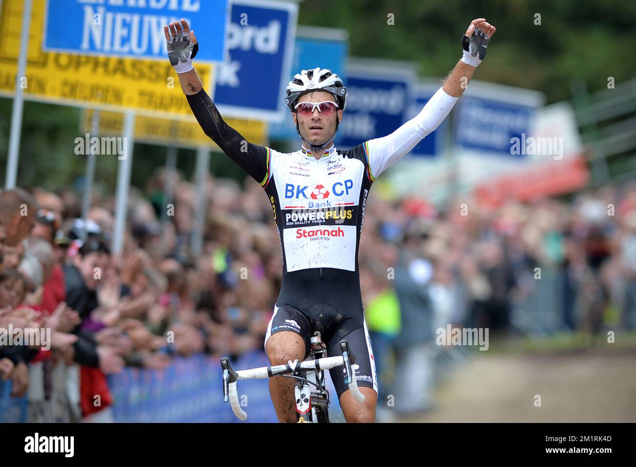 Belgian Niels Albert celebrates as he crosses the finish line to win ...