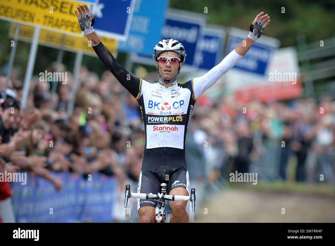 Belgian Niels Albert celebrates as he crosses the finish line to win ...