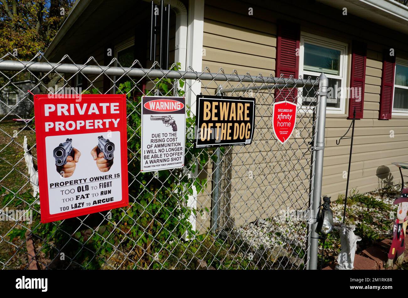 Warning signs on fence of Republican midwestern home in Indiana Stock ...