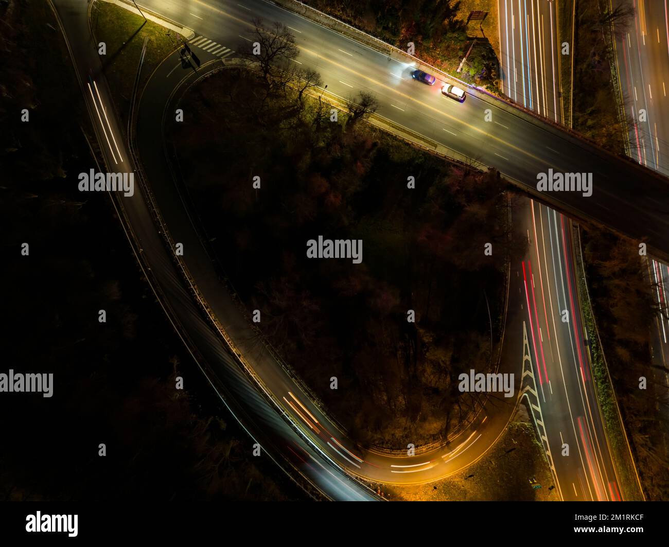An aerial view of an exit ramp of a highway at night Stock Photo - Alamy
