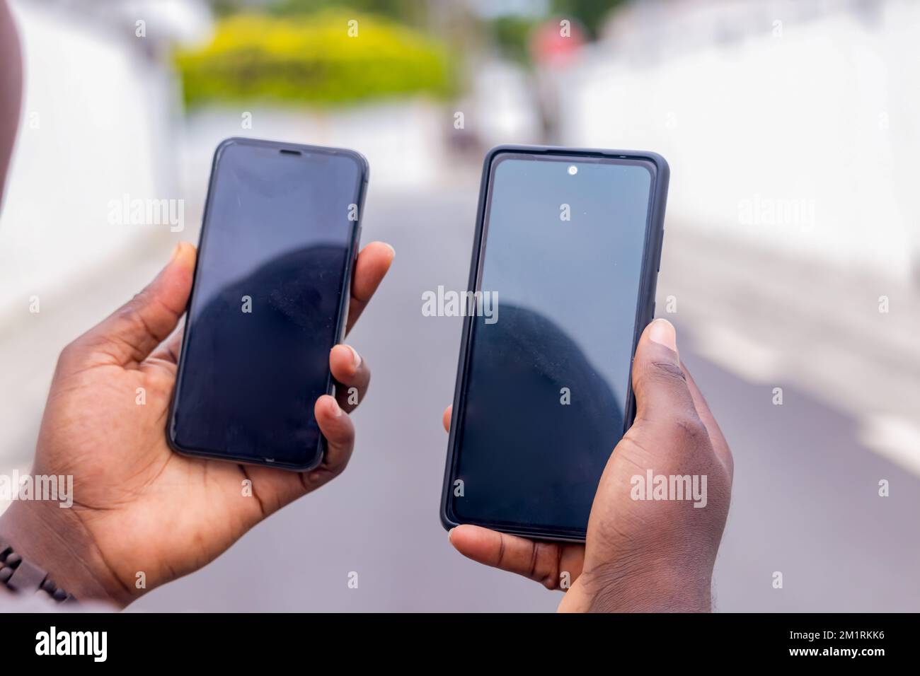 Person seen holding smartphone hi-res stock photography and images - Alamy