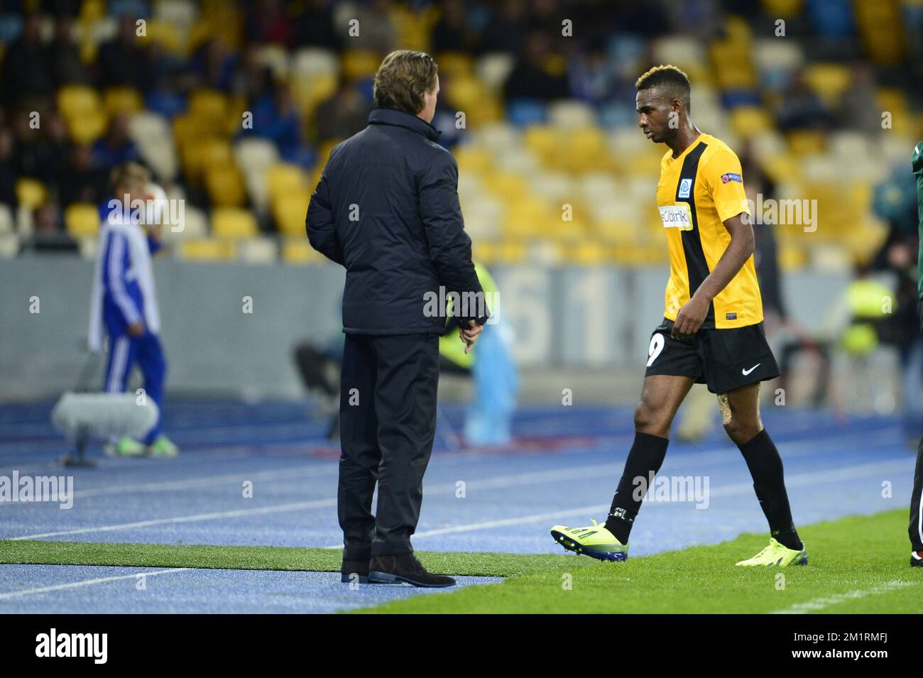 Genk's Pele Ilombe Mboyo leaves the pitch after being injured during a ...