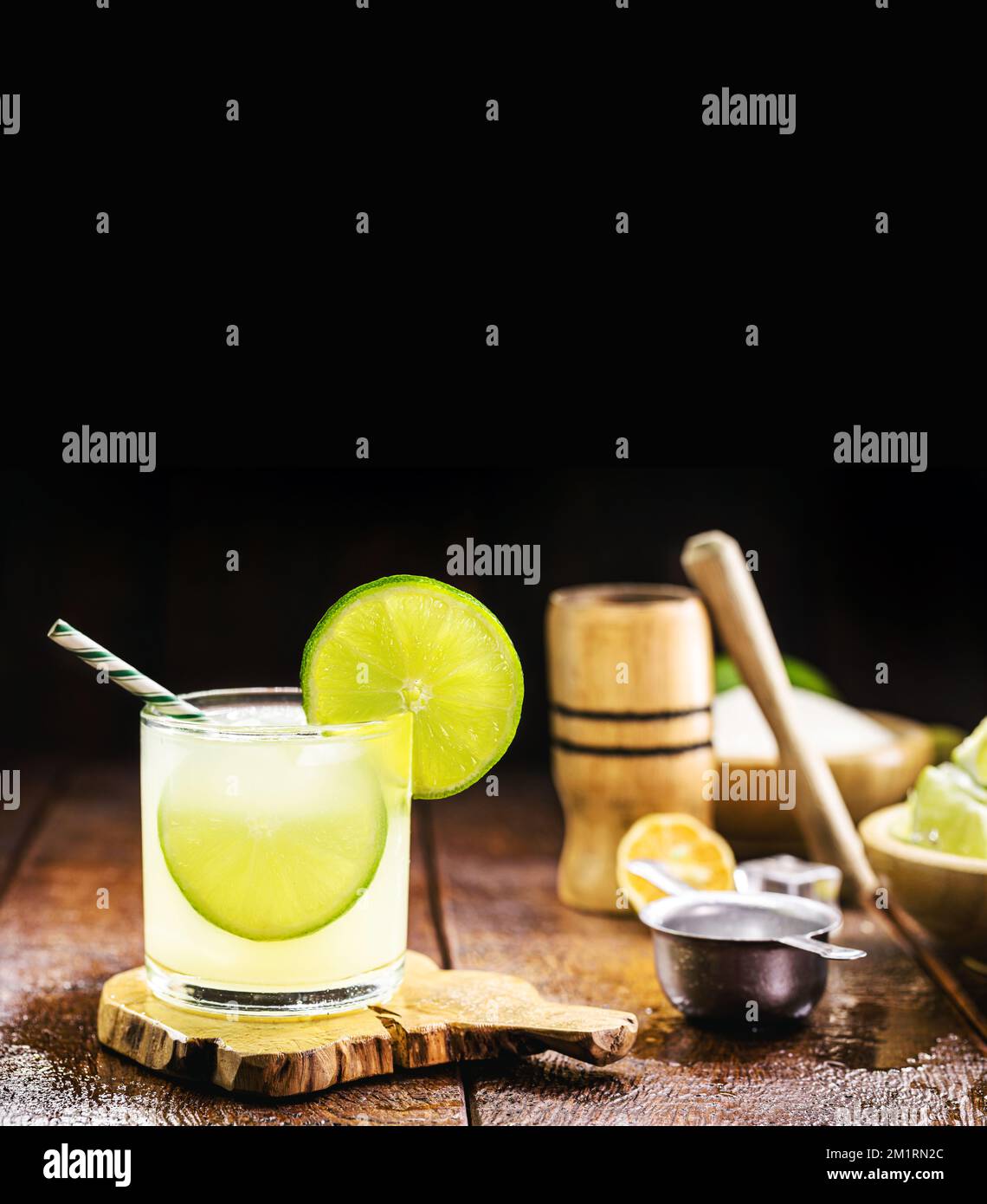Lime alcoholic drink, made in Brazil, called caipirinha, with ice and ...