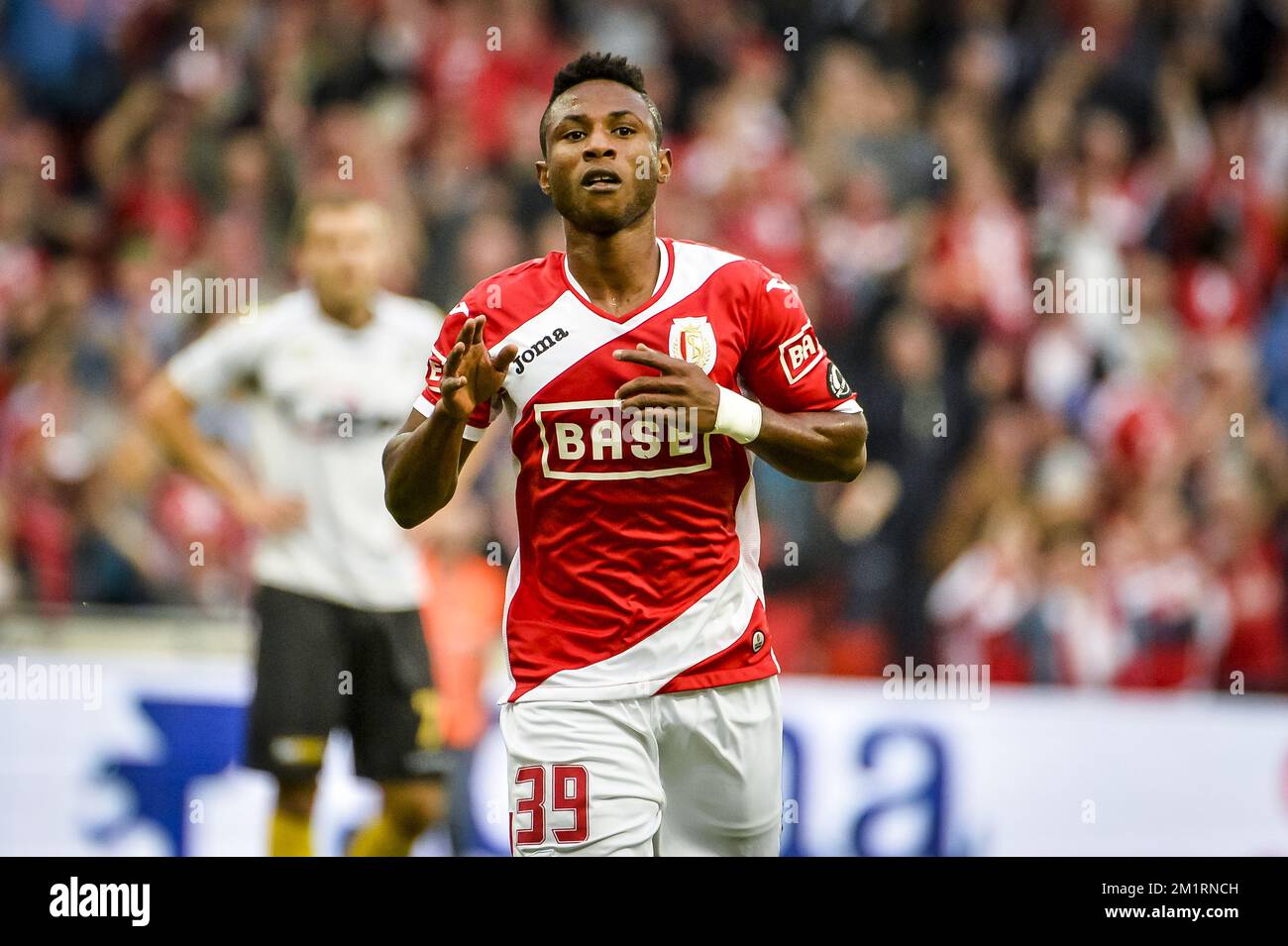 Standard's Imoh Ezekiel celebrates after scoring during the Jupiler Pro ...