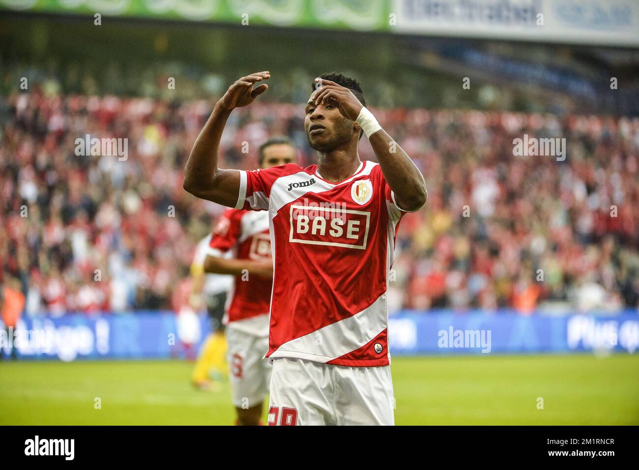 Standard's Imoh Ezekiel celebrates after scoring during the Jupiler Pro ...