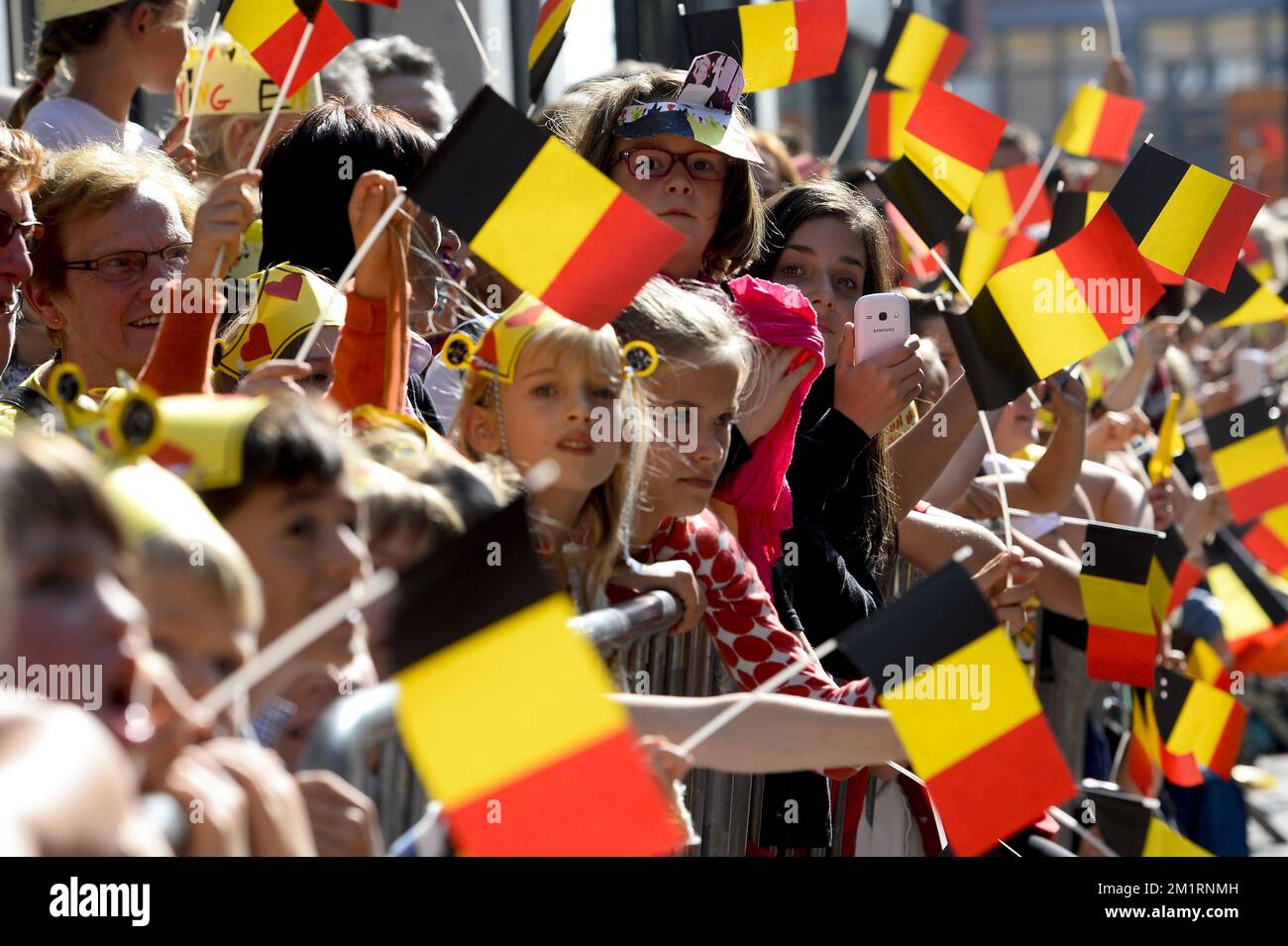Illustration picture shows the crowd waving Belgian flags as they wait ...