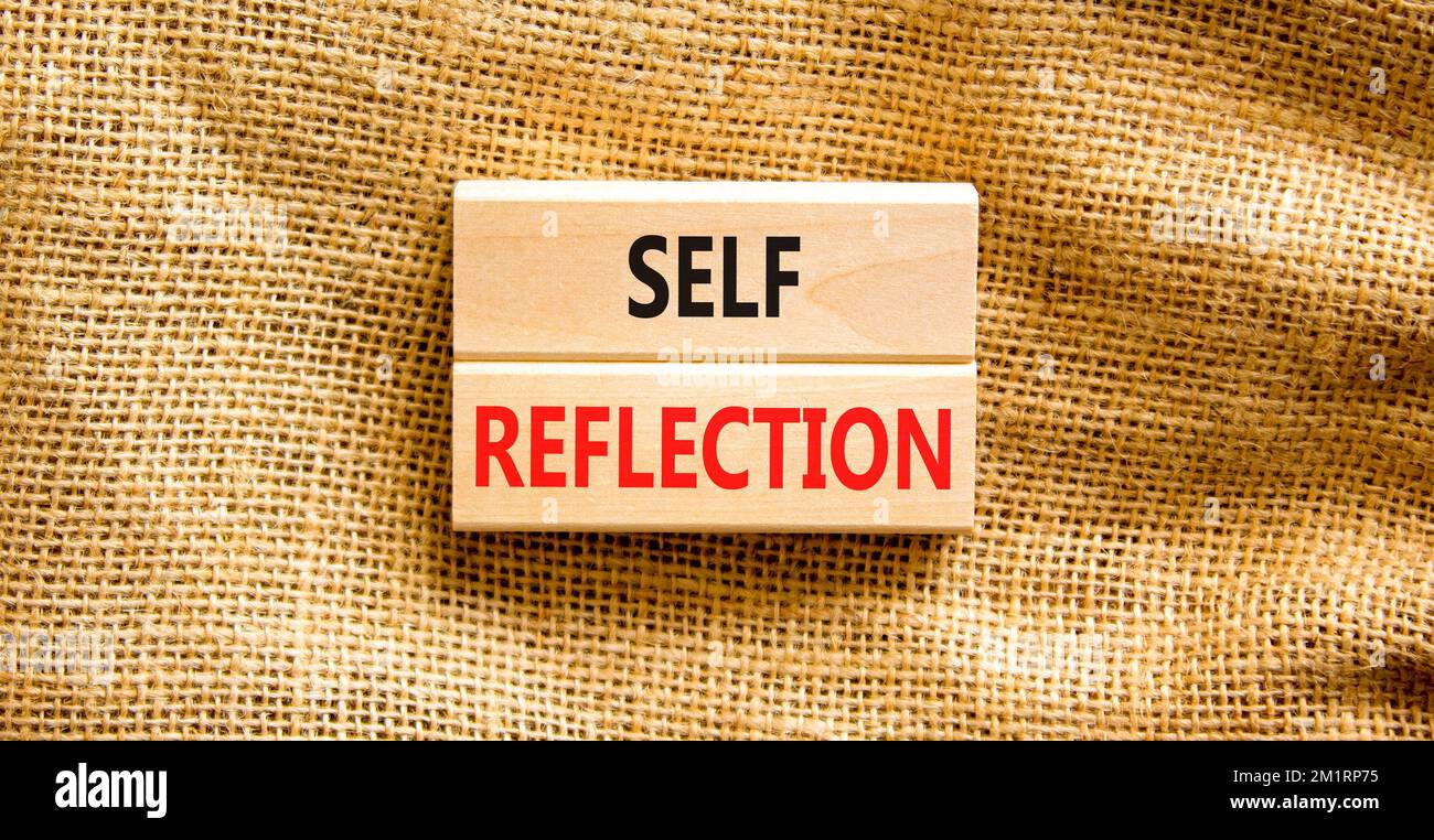 Self reflection symbol. Concept word Self reflection typed on wooden ...