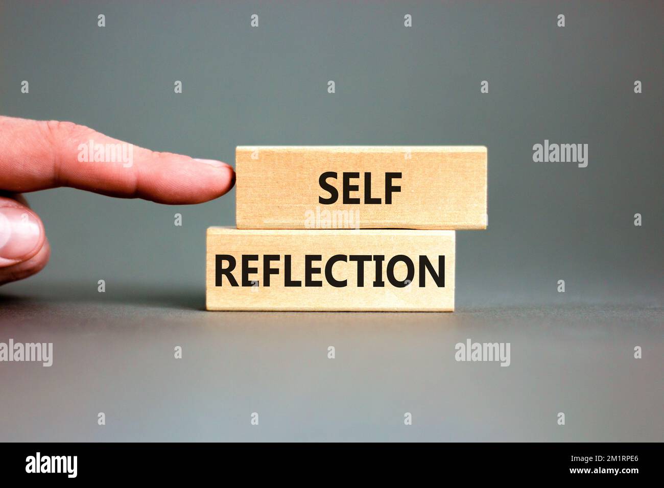 Self reflection symbol. Concept word Self reflection typed on wooden ...