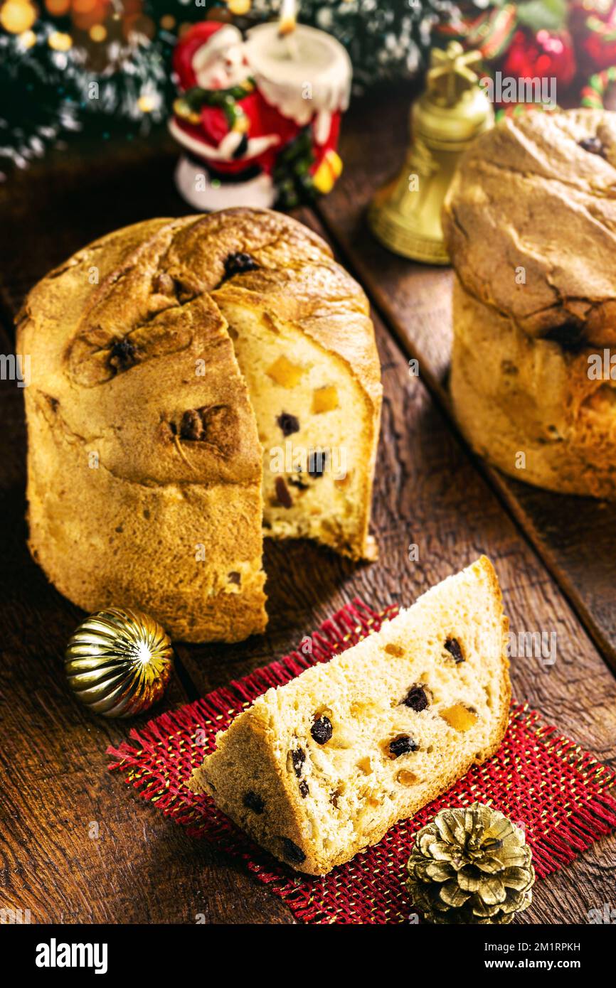 Homemade Panettones on a wooden table, cake or baked bread, typical of ...