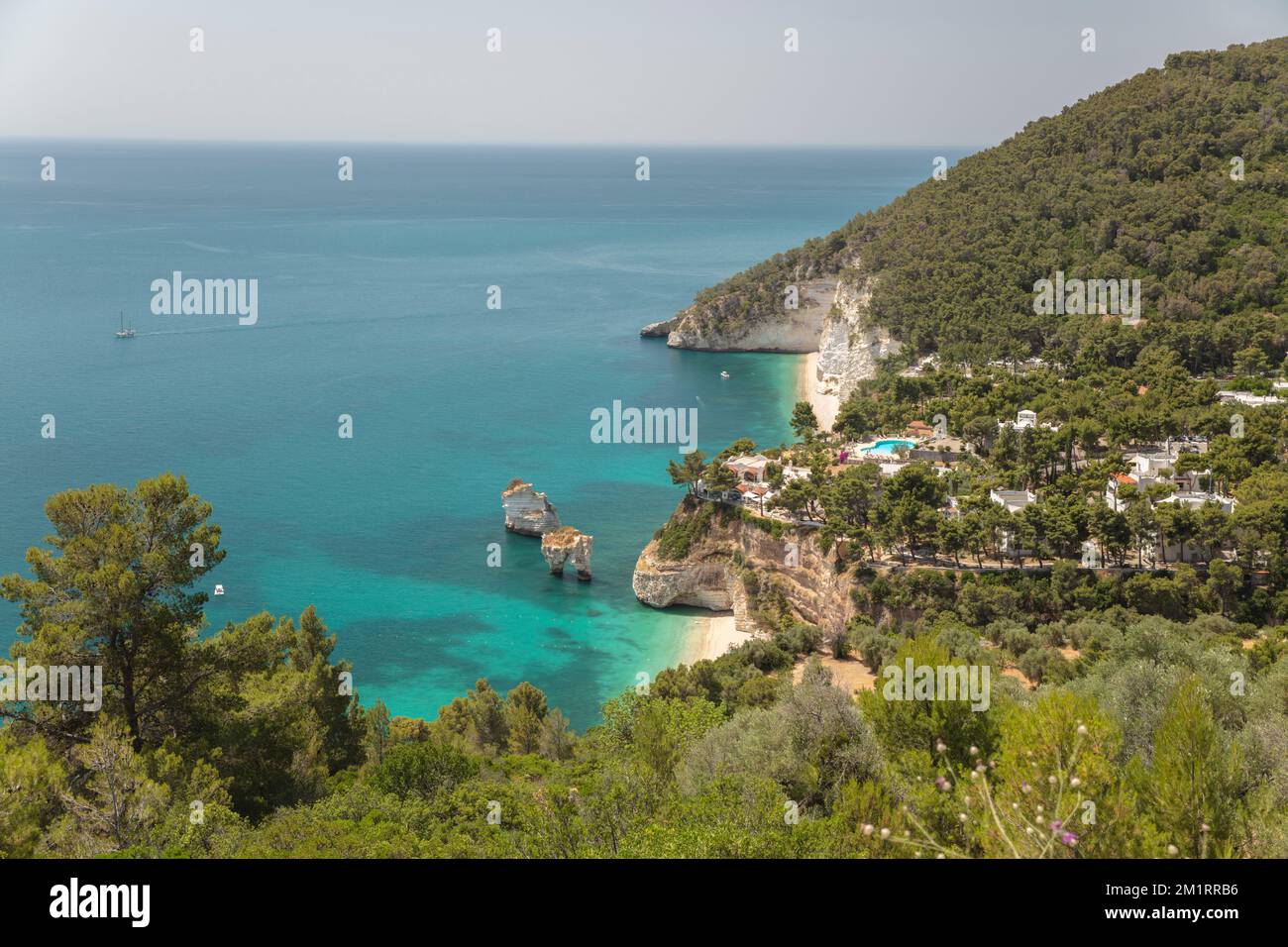 Faraglioni di Baia delle Zagare rocks with beaches and coastline, near ...