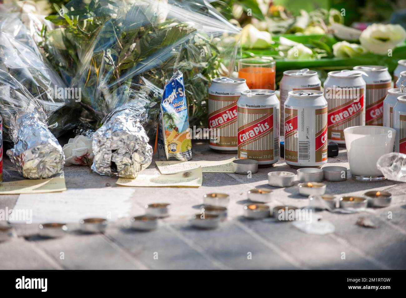 Illustration picture shows flowers, candles and Cara beer cans during a ...