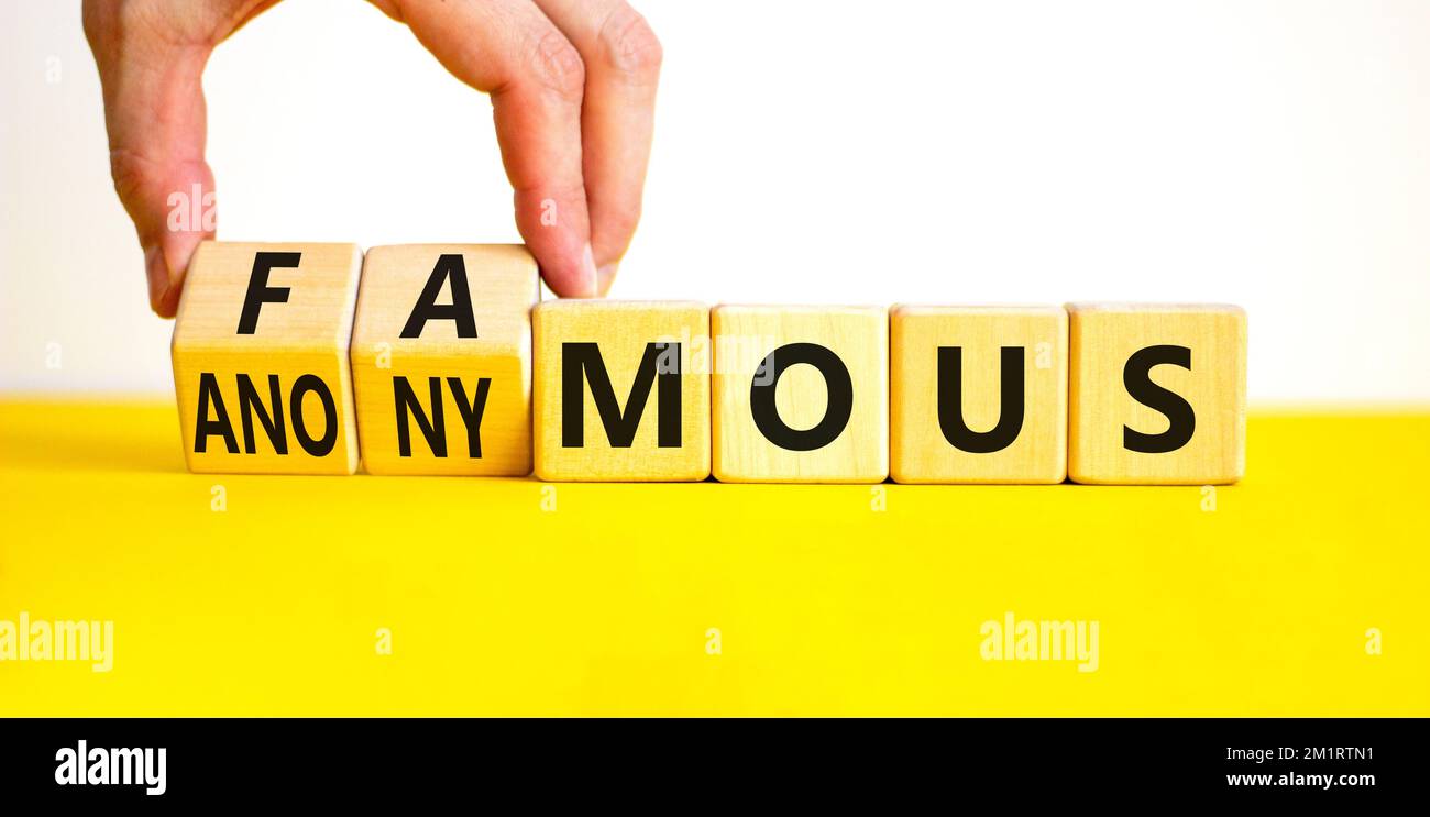 Famous or anonymous symbol. Concept word Famous and Anonymous on wooden ...