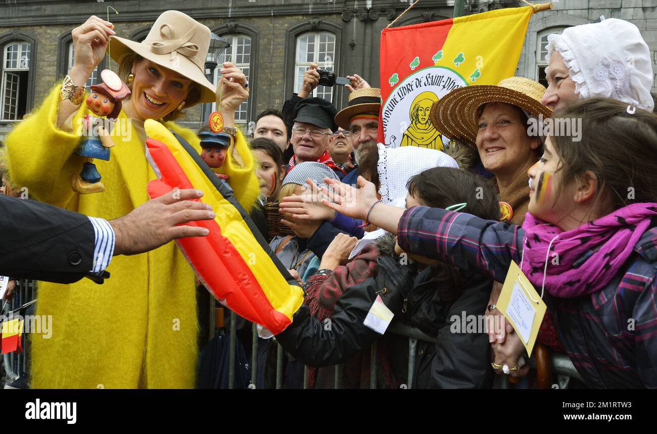 Queen Mathilde of Belgium receives Tchantches puppet during the 'Joyous ...