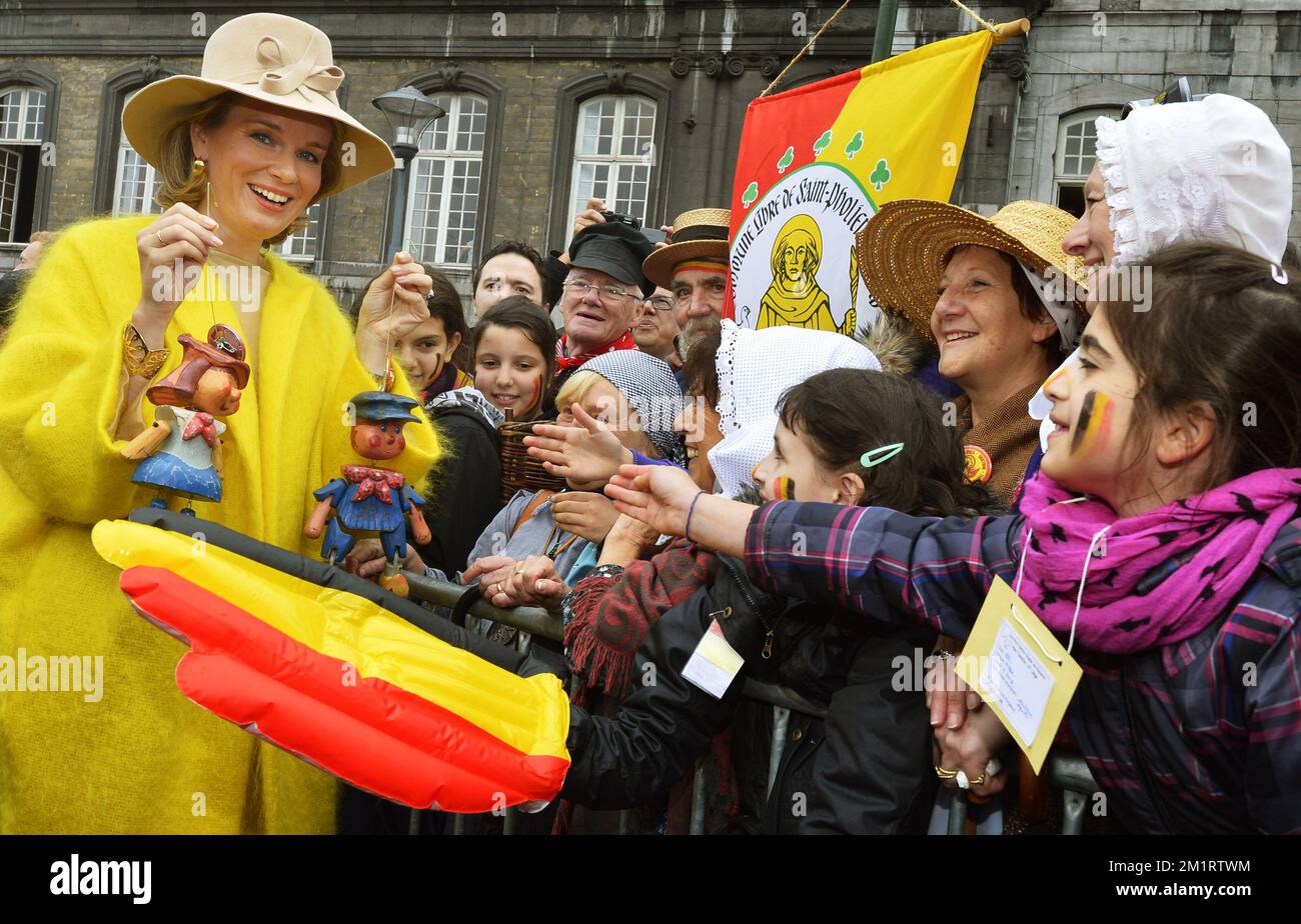 Queen Mathilde of Belgium receives Tchantches puppet during the 'Joyous ...