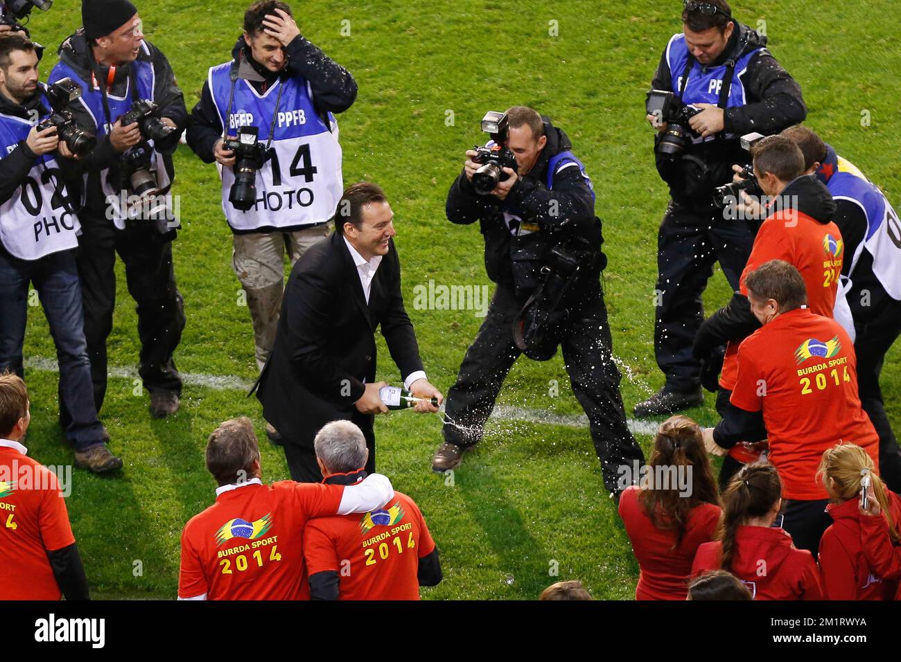 Belgium's head coach Marc Wilmots celebrates after a soccer game ...