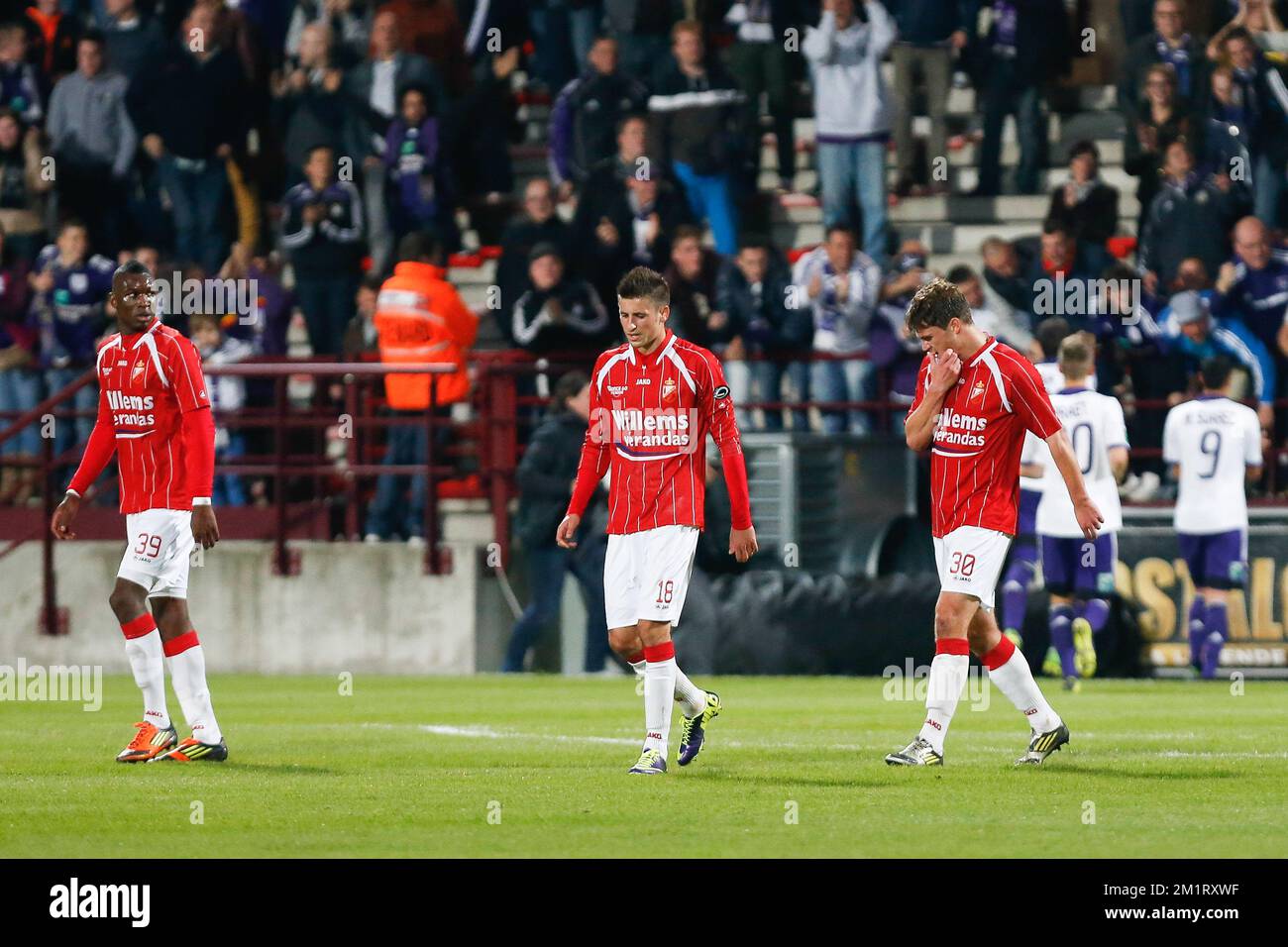20131018 - BRUSSELS, BELGIUM: Mons' players look dejected during the ...