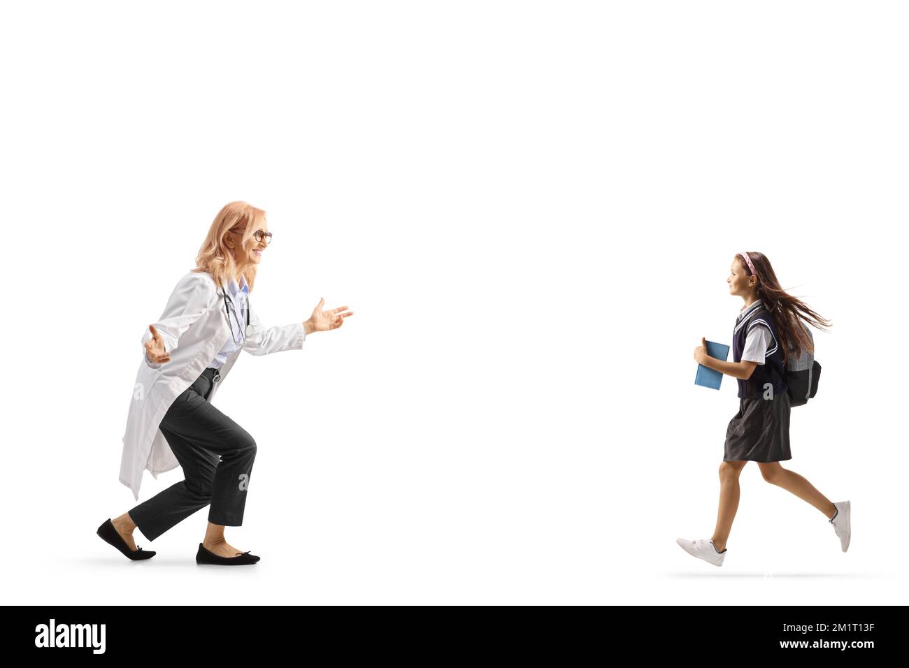 Schoolgirl with a book running towards a female doctor isolated on ...