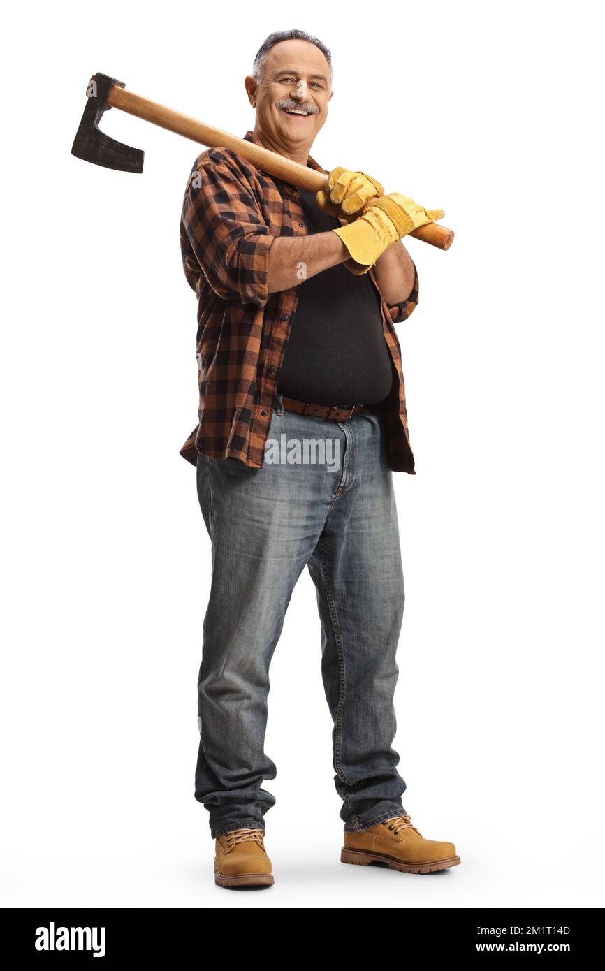 Full length portrait of a mature man smiling and holding an axe on his ...