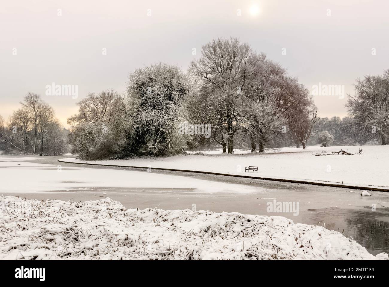 Verulamium Park St. Albans showing the frozen lake and beautiful snow ...