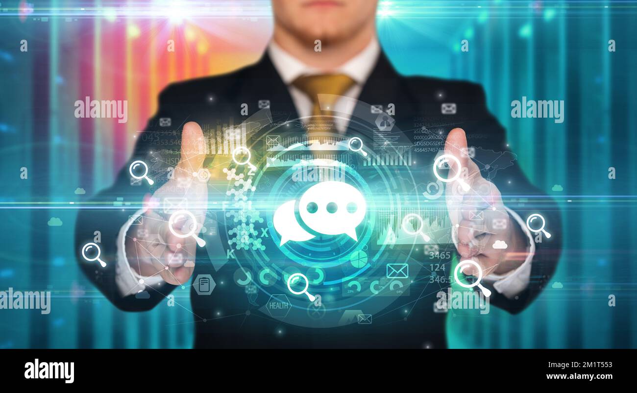 Businessman holding technology icon concept Stock Photo - Alamy