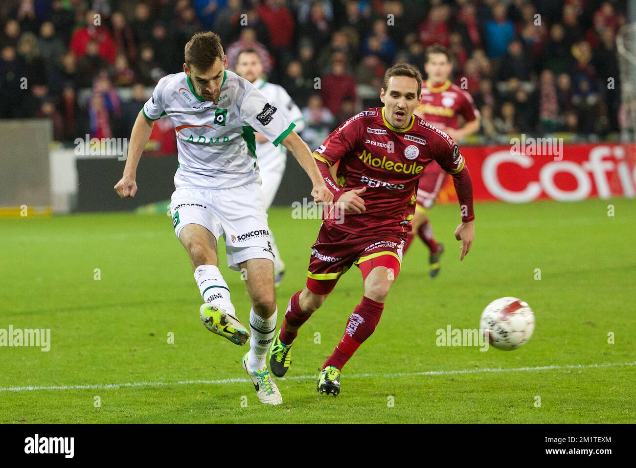 20131218 - WAREGEM, BELGIUM: Cercle's Gregory Mertens and Essevee's ...