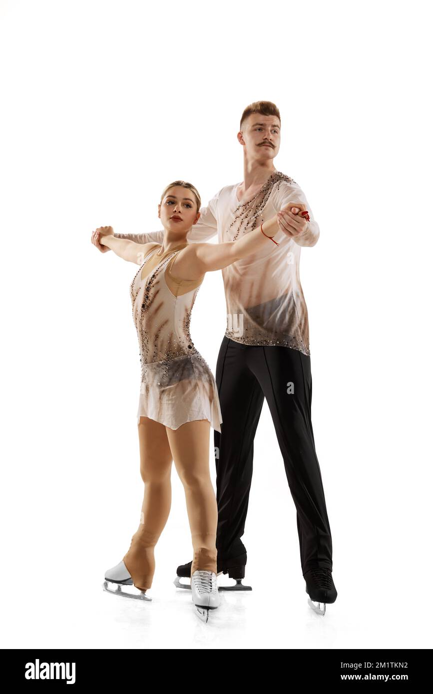 Portrait of young man and woman, figure skating athletes in beautiful ...