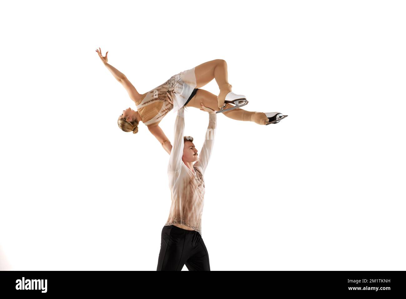 Portrait of young man and woman, figure skating athletes performing ...