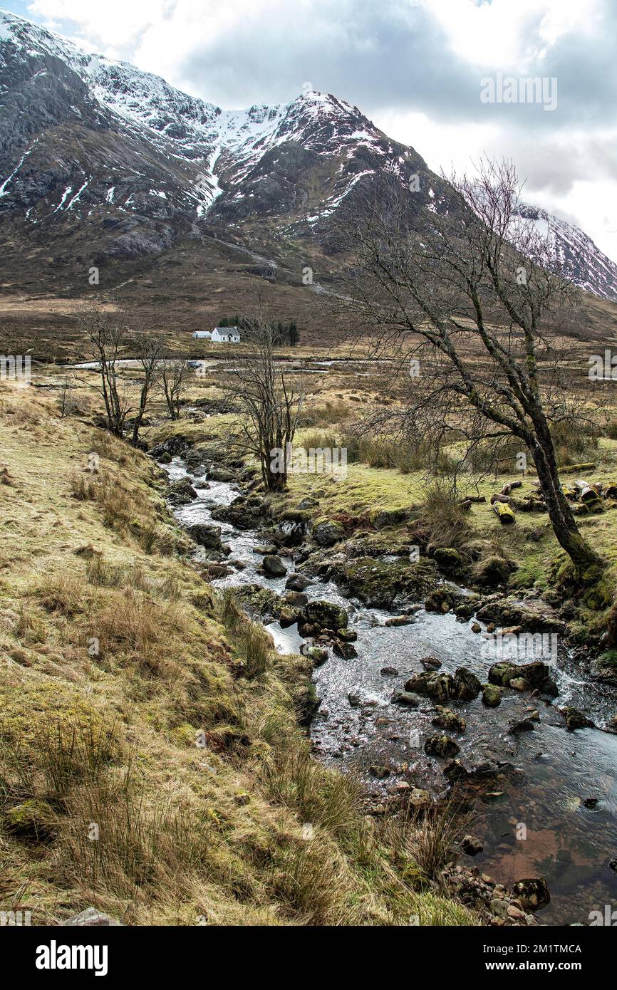 A view along a small stream of Glencoe in the Western Highlands. with a ...