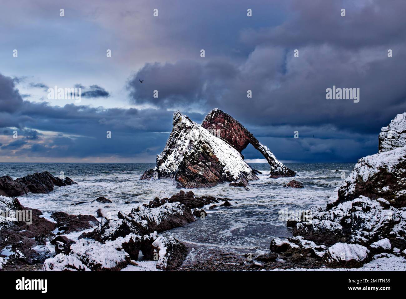Bow Fiddle Rock Portknockie Moray Coast Scotland dark clouds a fresh ...