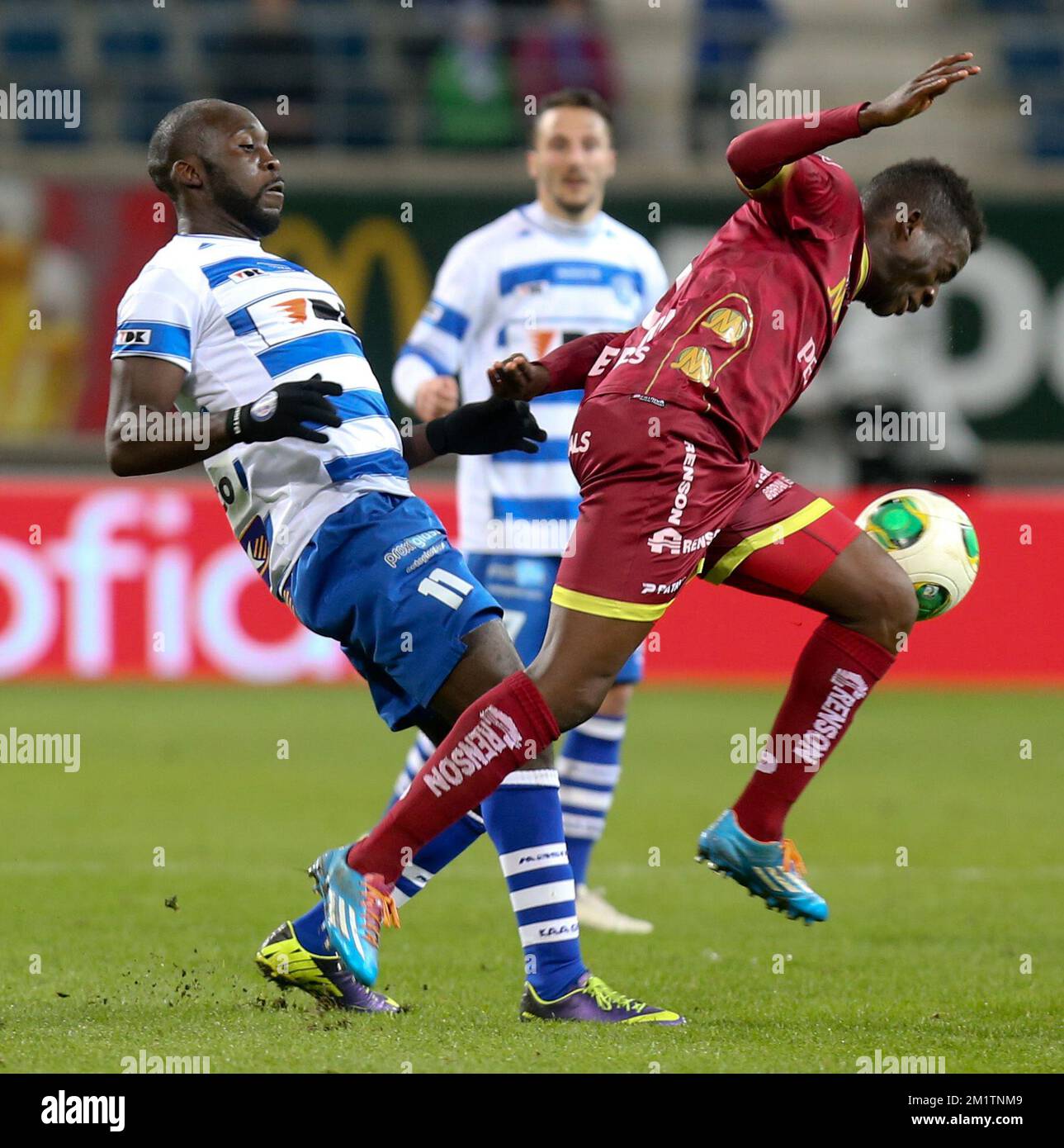 20140129 - GENT, BELGIUM: Gent's Herve Kage and Essevee's Bryan Verboom ...