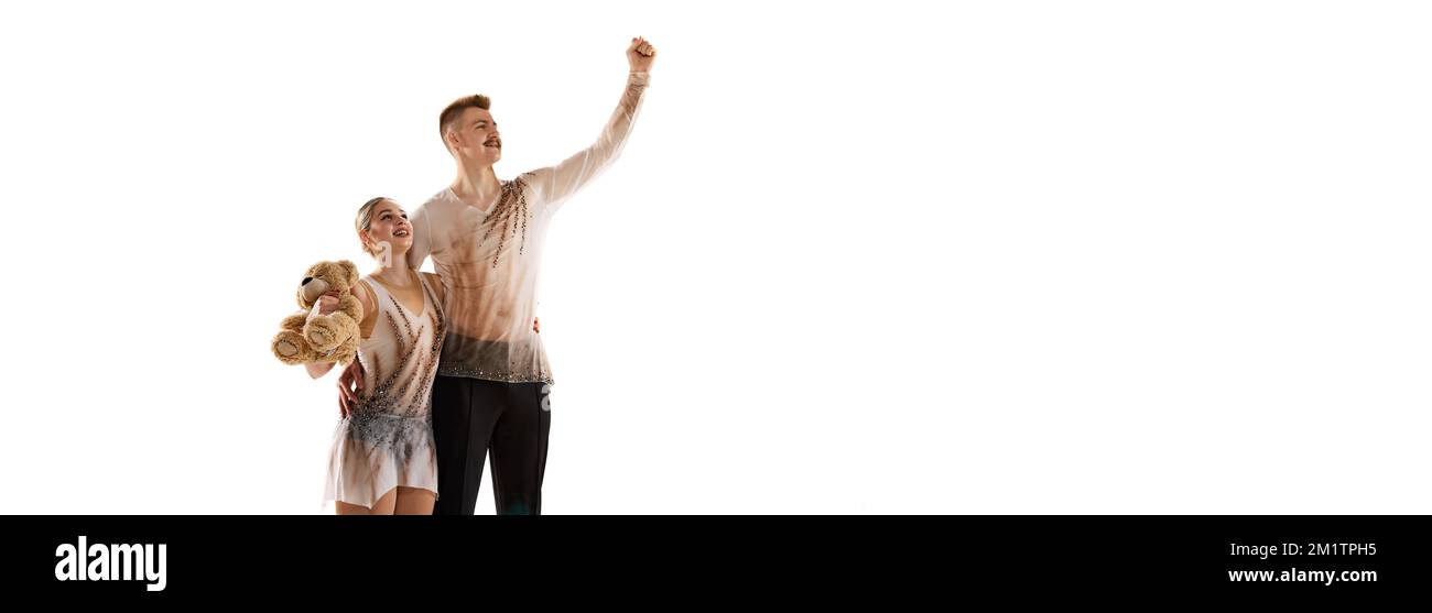 Win. Portrait of young man and woman, figure skating athletes posing ...