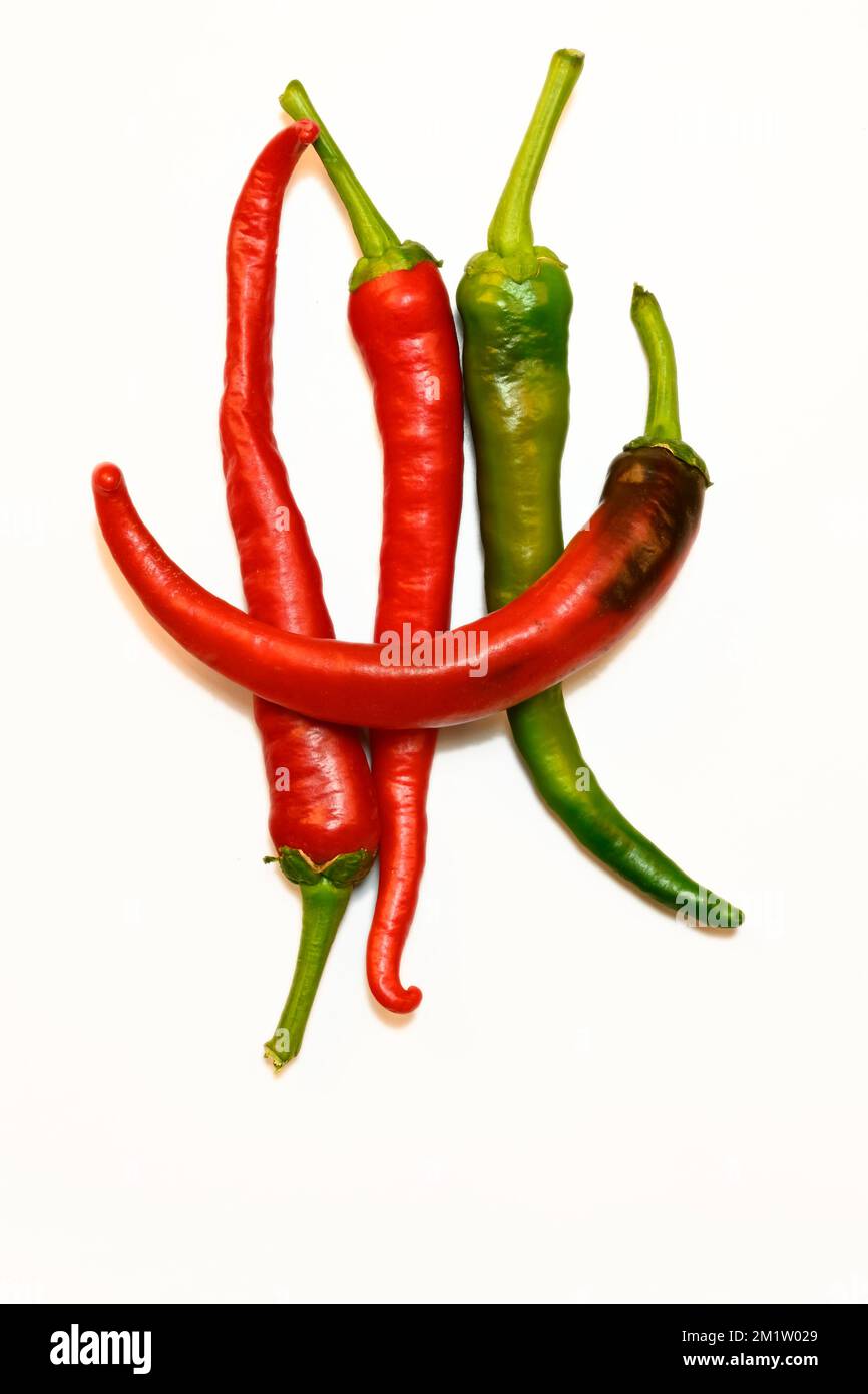 Group of red natural hot peppers. White background Stock Photo - Alamy