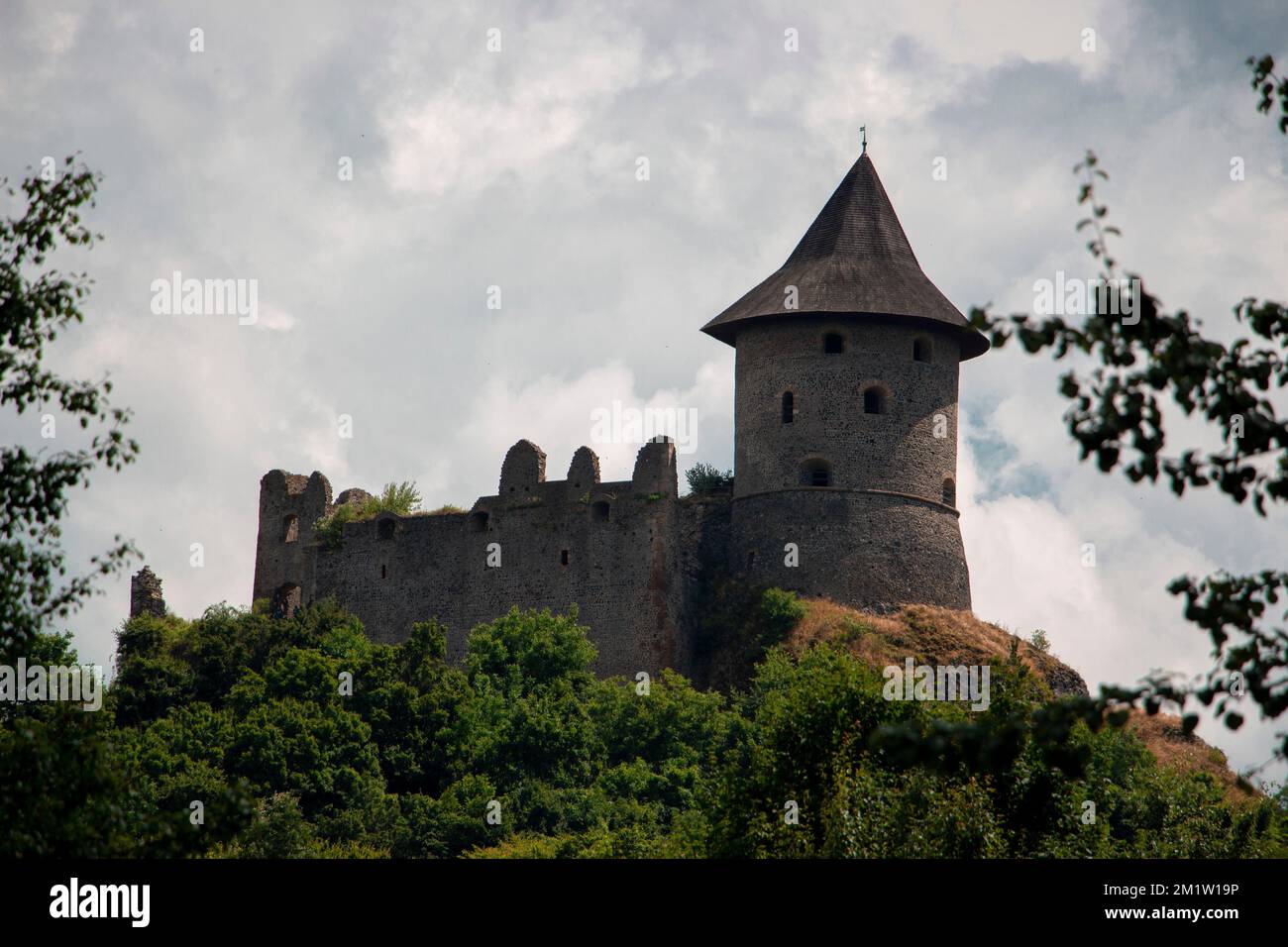 The Somoska castle on the top of a green hill Stock Photo - Alamy