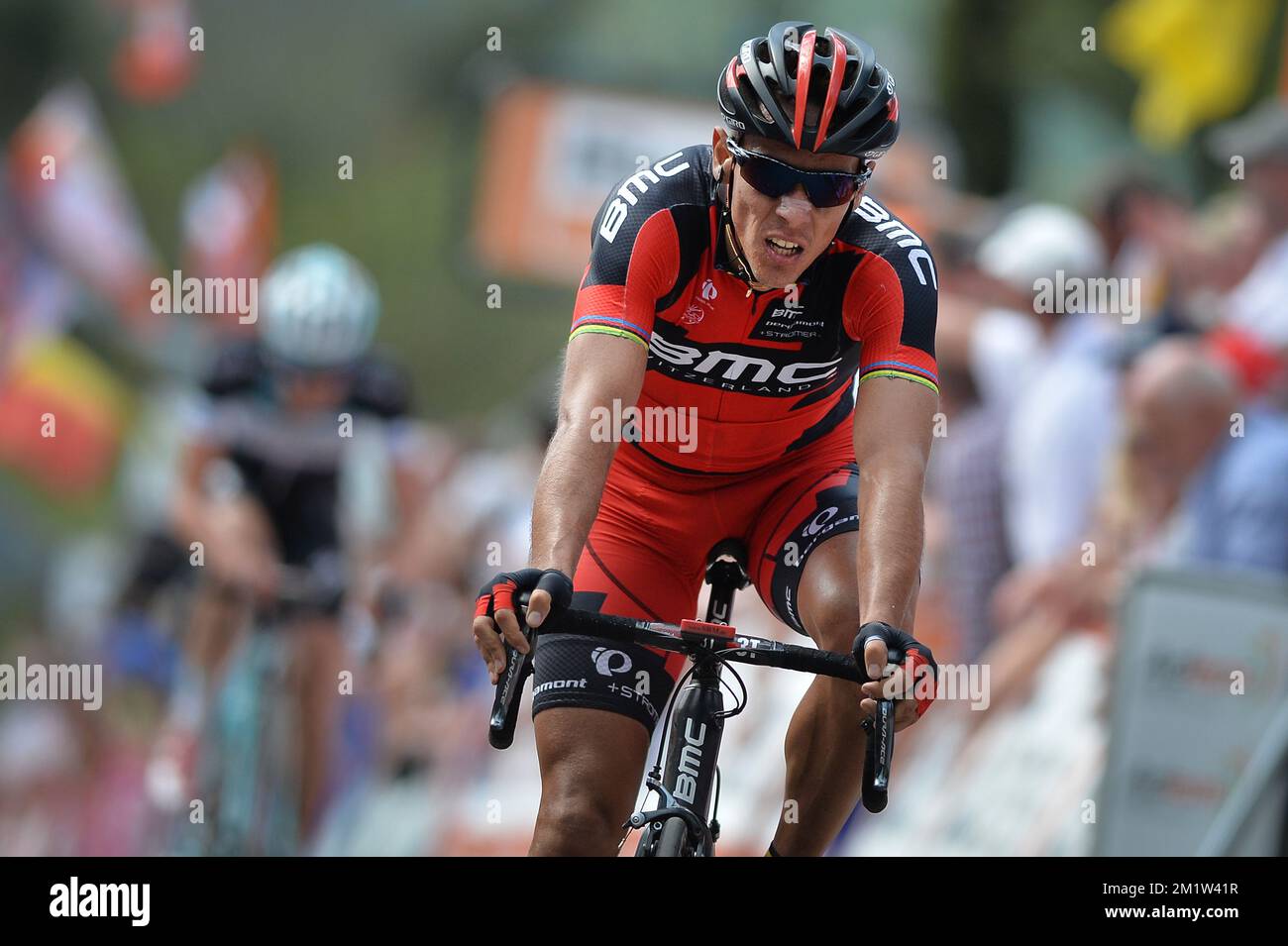 Belgian Philippe Gilbert of BMC Racing Team crosses the finish line at ...