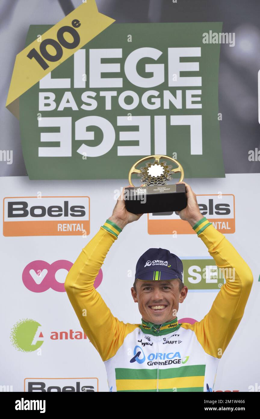Winner Australian Simon Gerrans of Orica GreenEDGE celebrates with the ...