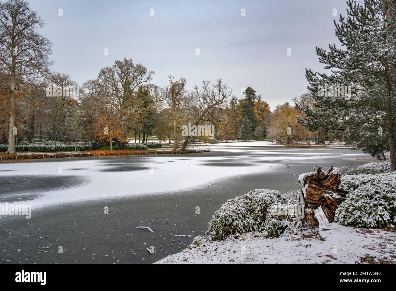 Scattering of snow at Claremont Gardens in Esher Surrey UK Stock Photo ...