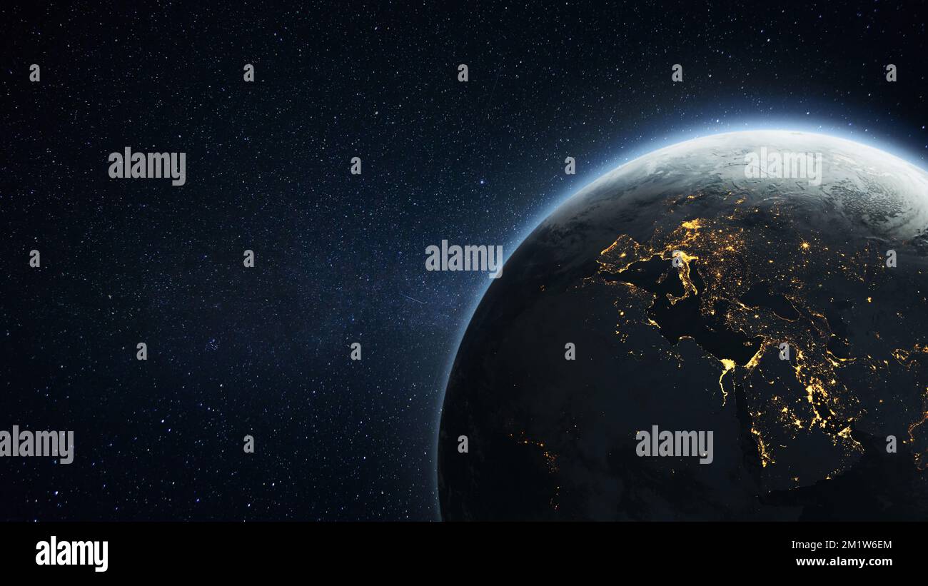 Amazing beautiful planet earth with yellow city lights in starry space ...