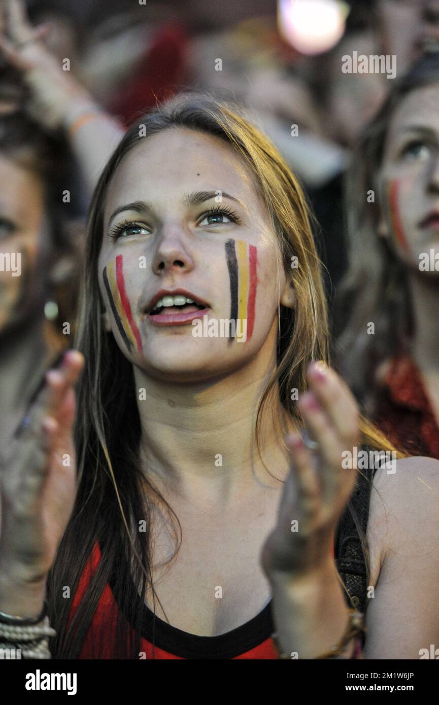 Red Devils fans pictured viewing on a big screen of the round of 16 ...