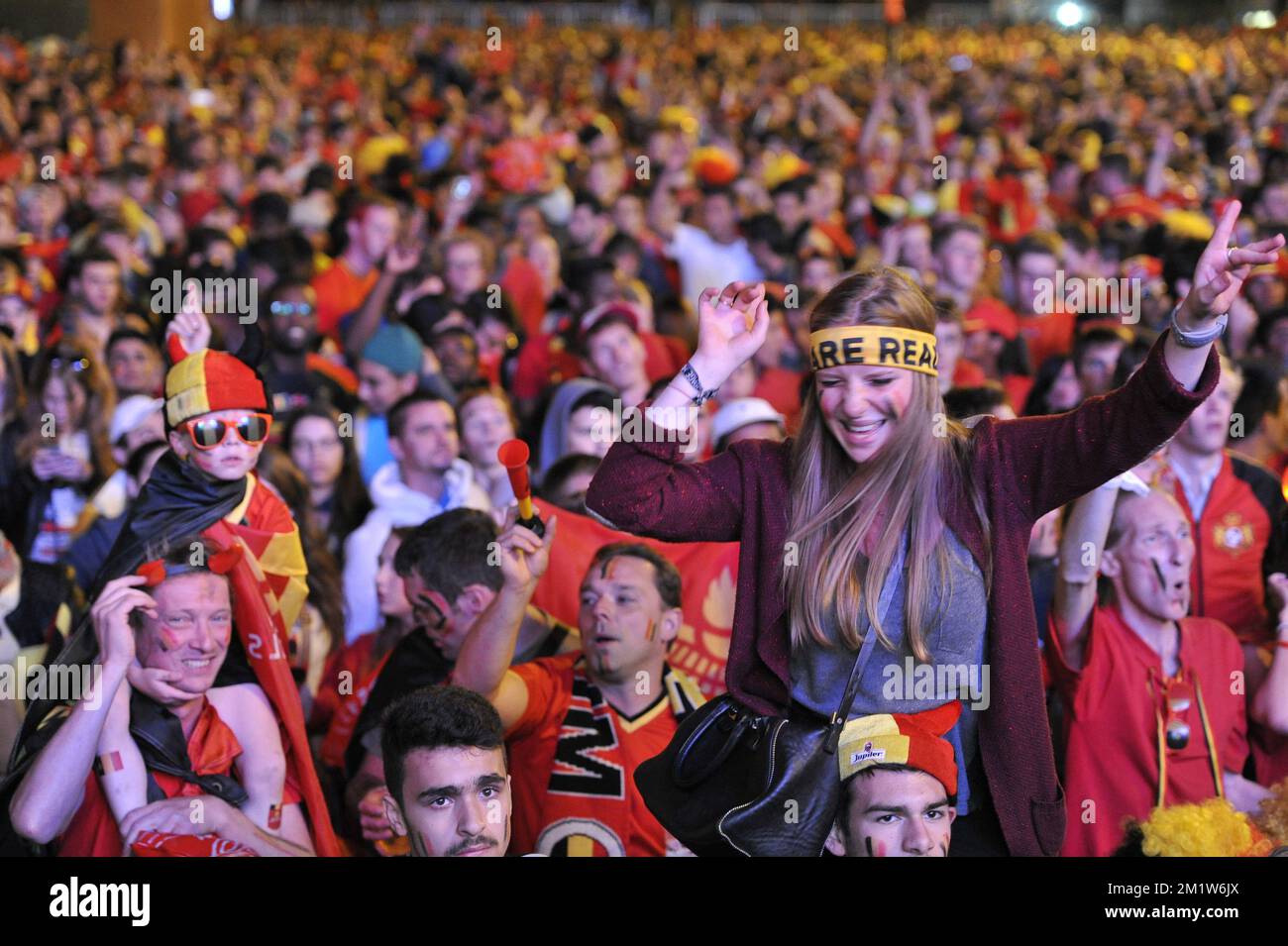 Red Devils fans celebrate whilst viewing on a big screen of the round ...