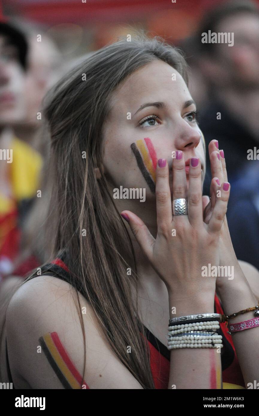 Red Devils fans pictured viewing on a big screen of the round of 16 ...