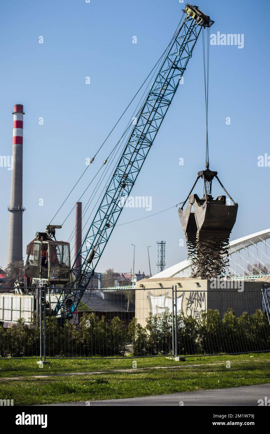 A vertical shot of a construction process with the Troja bridge in the ...
