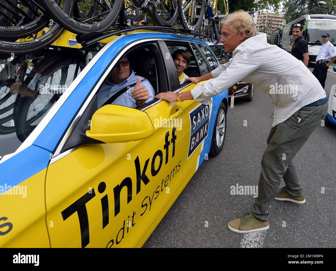 Oleg Tinkoff (R) and Danish Team manager Bjarne Riis of team Saxo ...