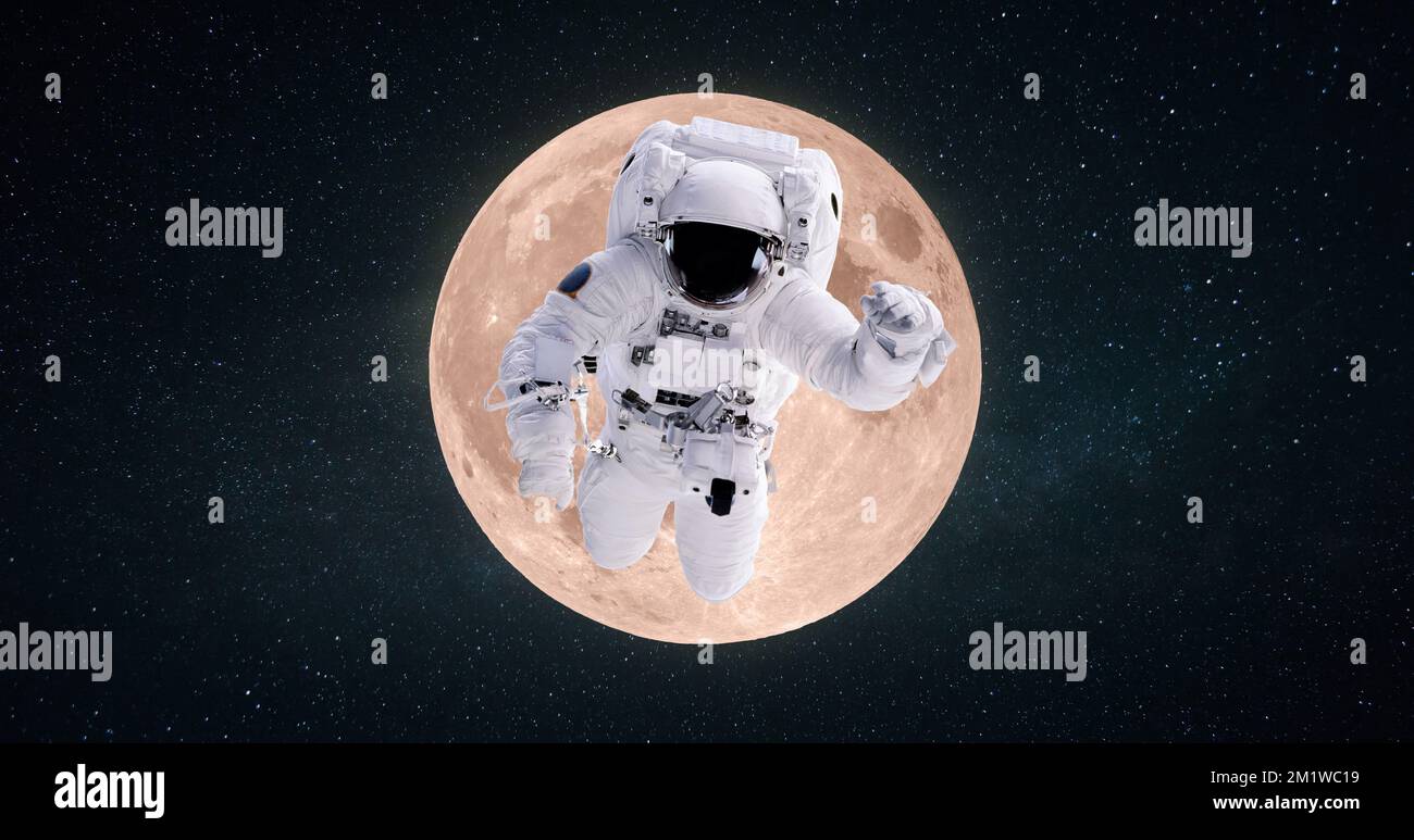 Space man astronaut flies in outer deep starry space on the background ...