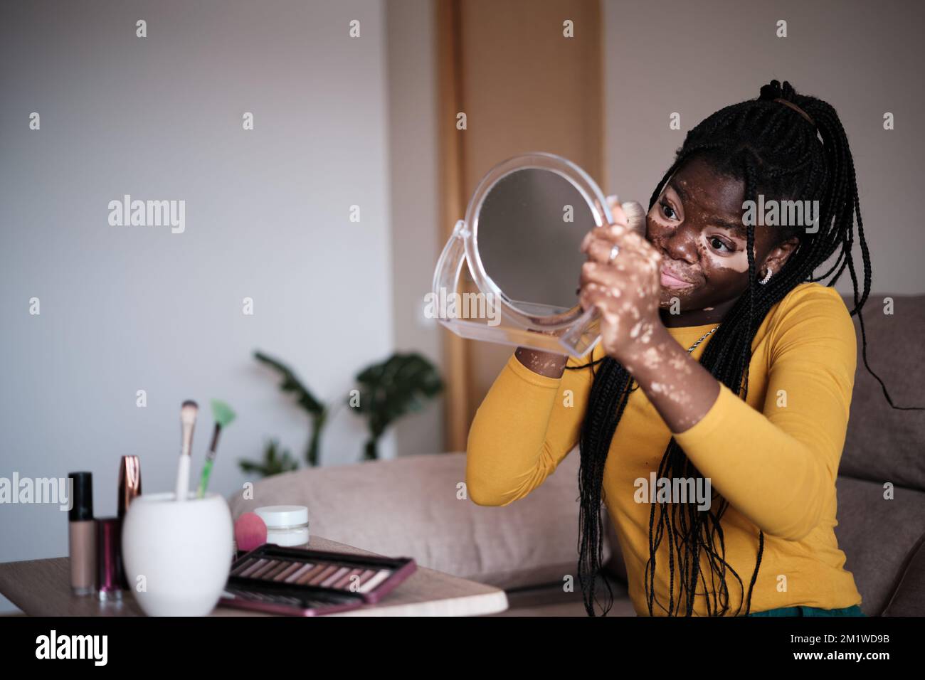Positive young lady apply hi-res stock photography and images - Alamy