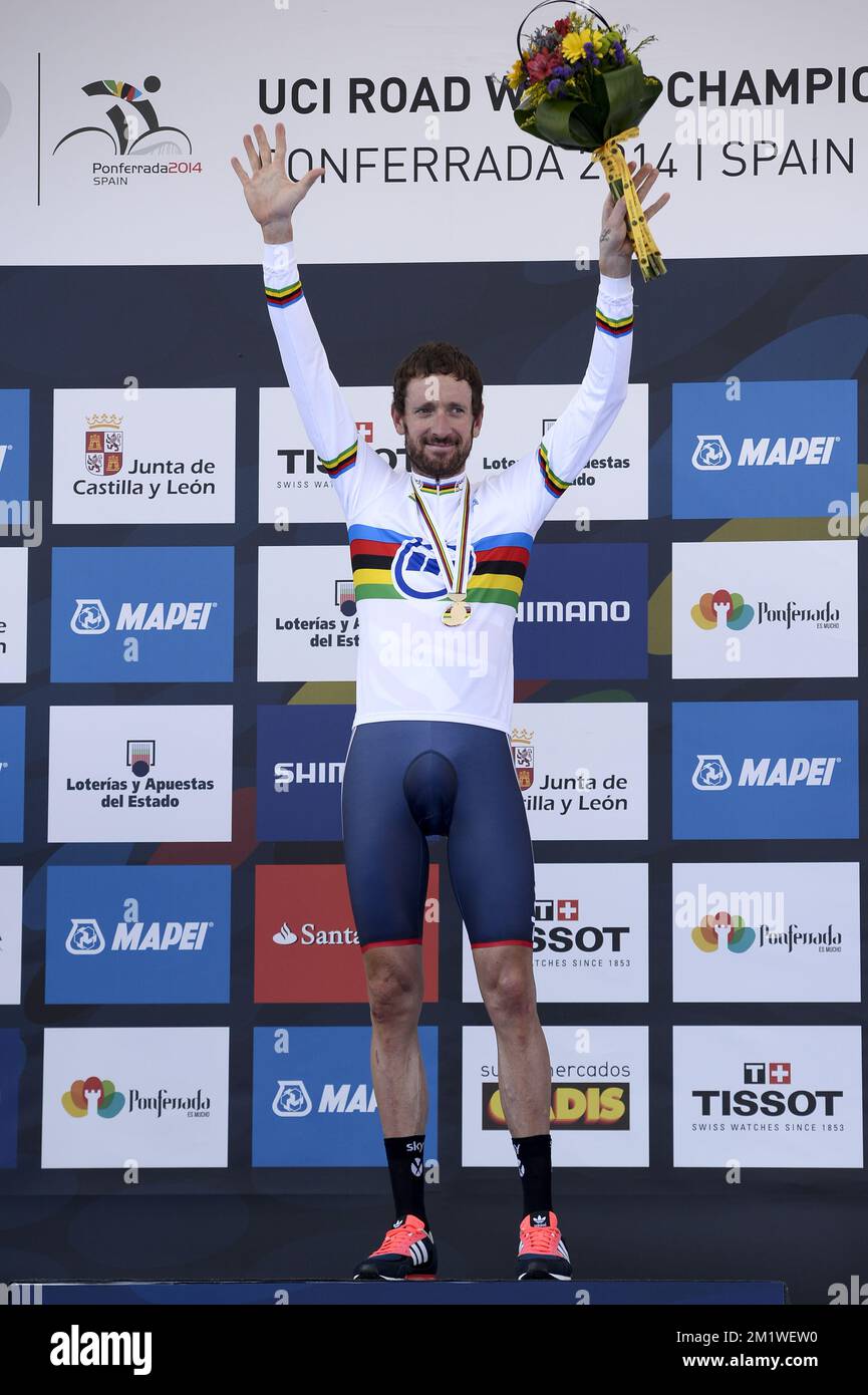 British Bradley Wiggins celebrates on the podium after winning the men ...