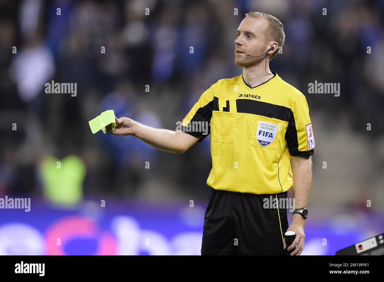 Referee Frank Bleyen holds the captains band during the Jupiler Pro ...